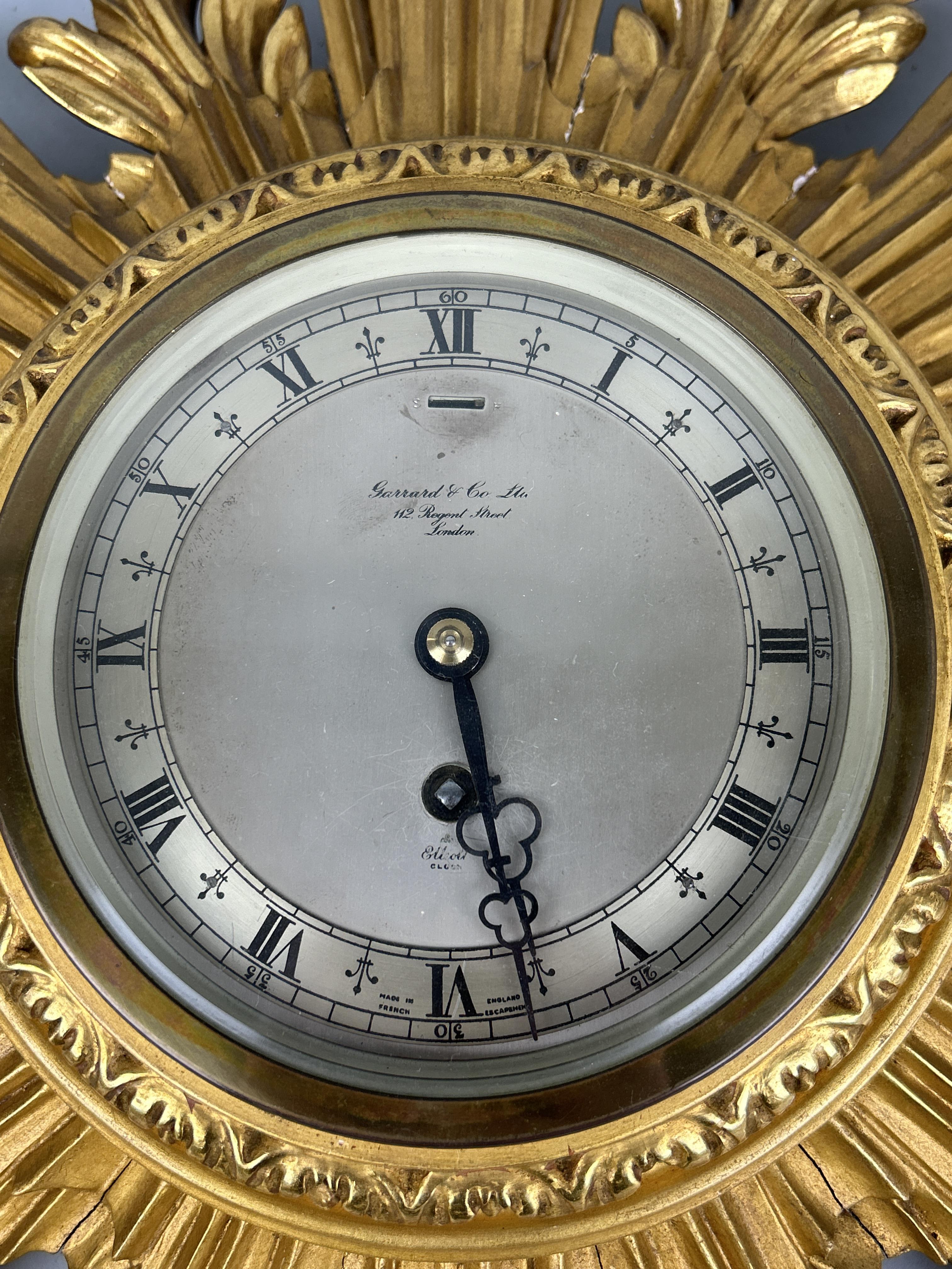 Lot 1042 - A GARRARD AND CO GILT WOOD SUNBURST WALL