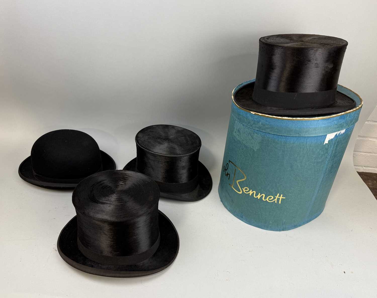 Lot 608 - A GROUP OF THREE TOP HATS AND A BOWLER HAT,