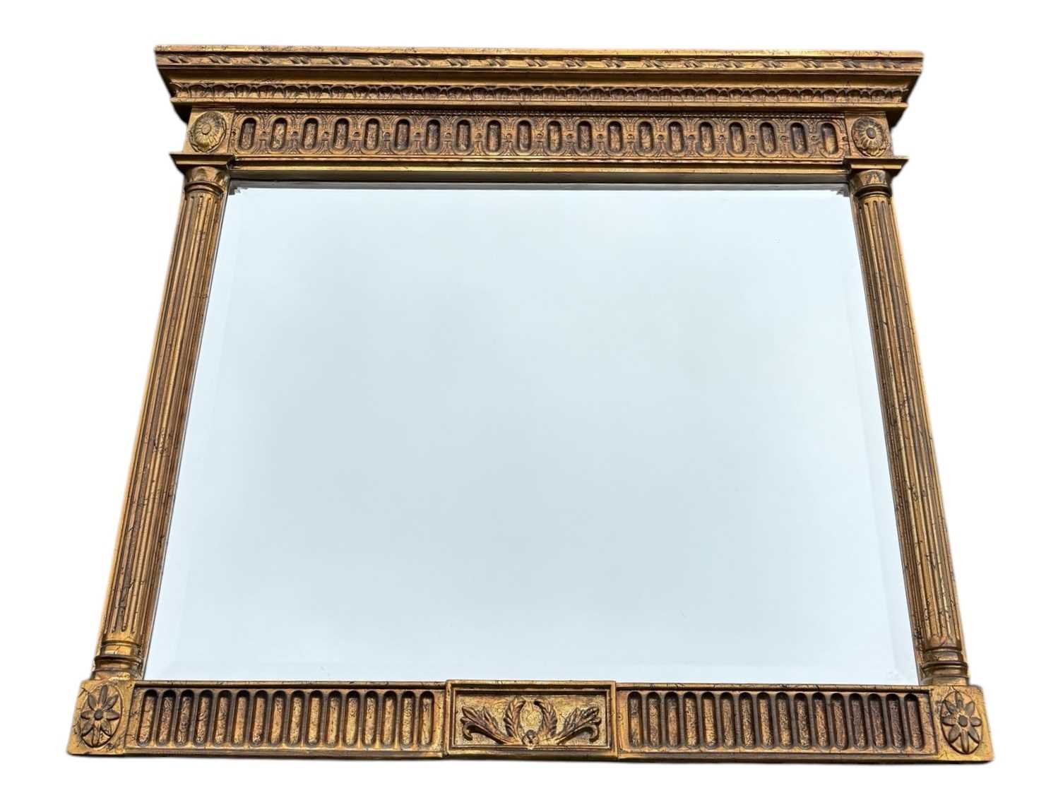Lot 812 - A REGENCY STYLE WALL MIRROR BY THE CAROLINA