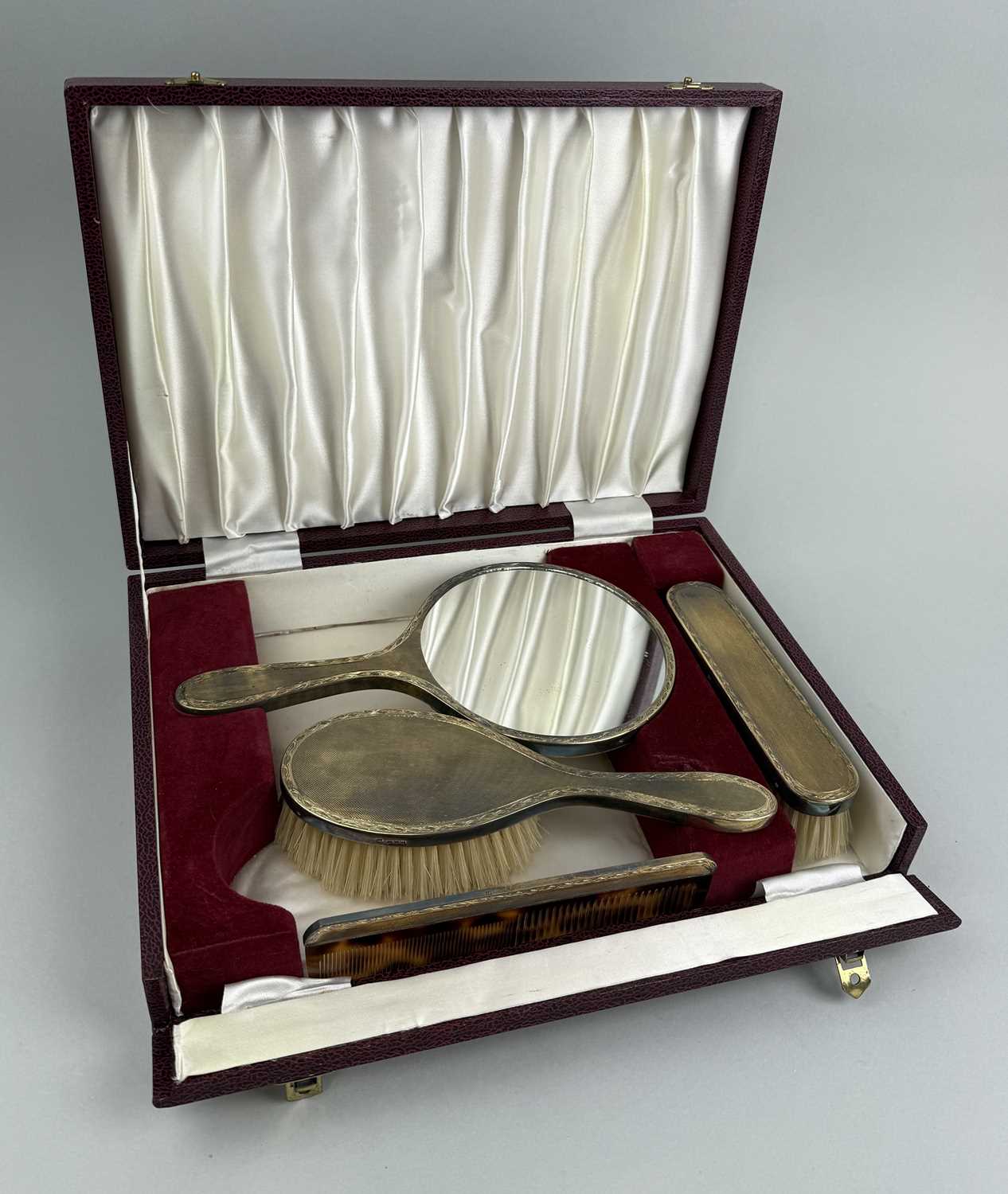 Lot 252 - A CASED SILVER VANITY SET