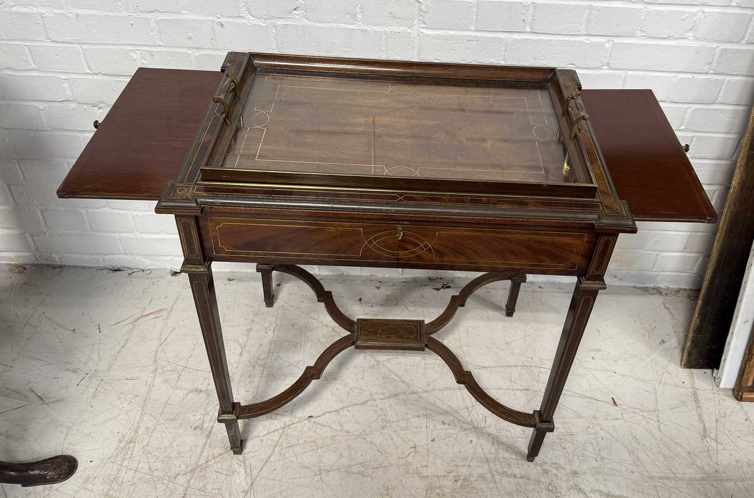 Lot 666 - AN ANTIQUE BRASS INLAID SILVER TABLE WITH