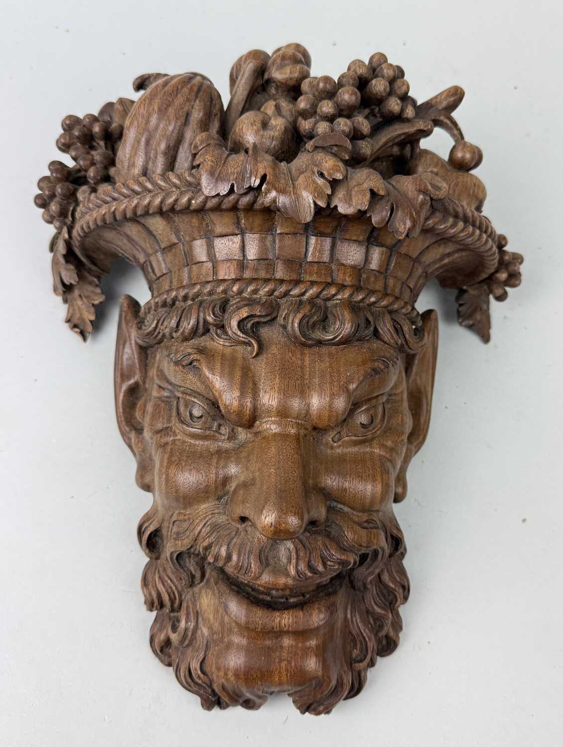 Lot 250 - A FINE CARVED HEAD OF BACCHUS