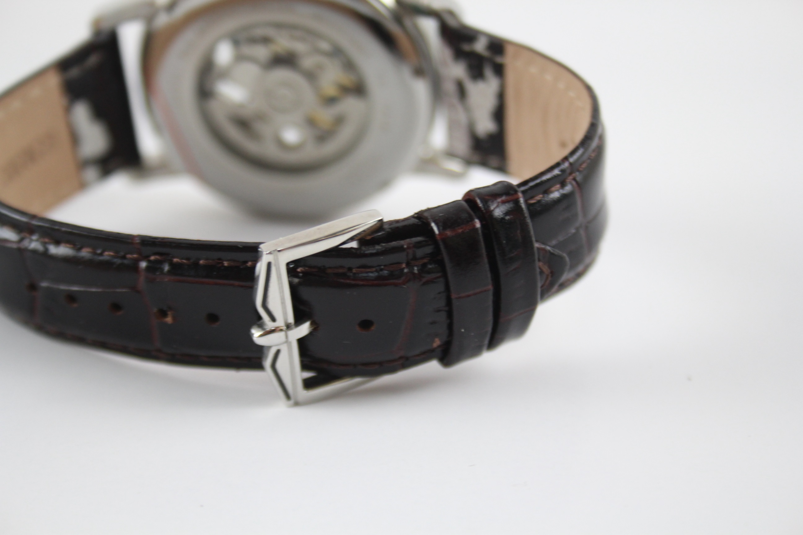 Lot 426 - A MEN'S ROTARY SKELETON DRESS WATCH