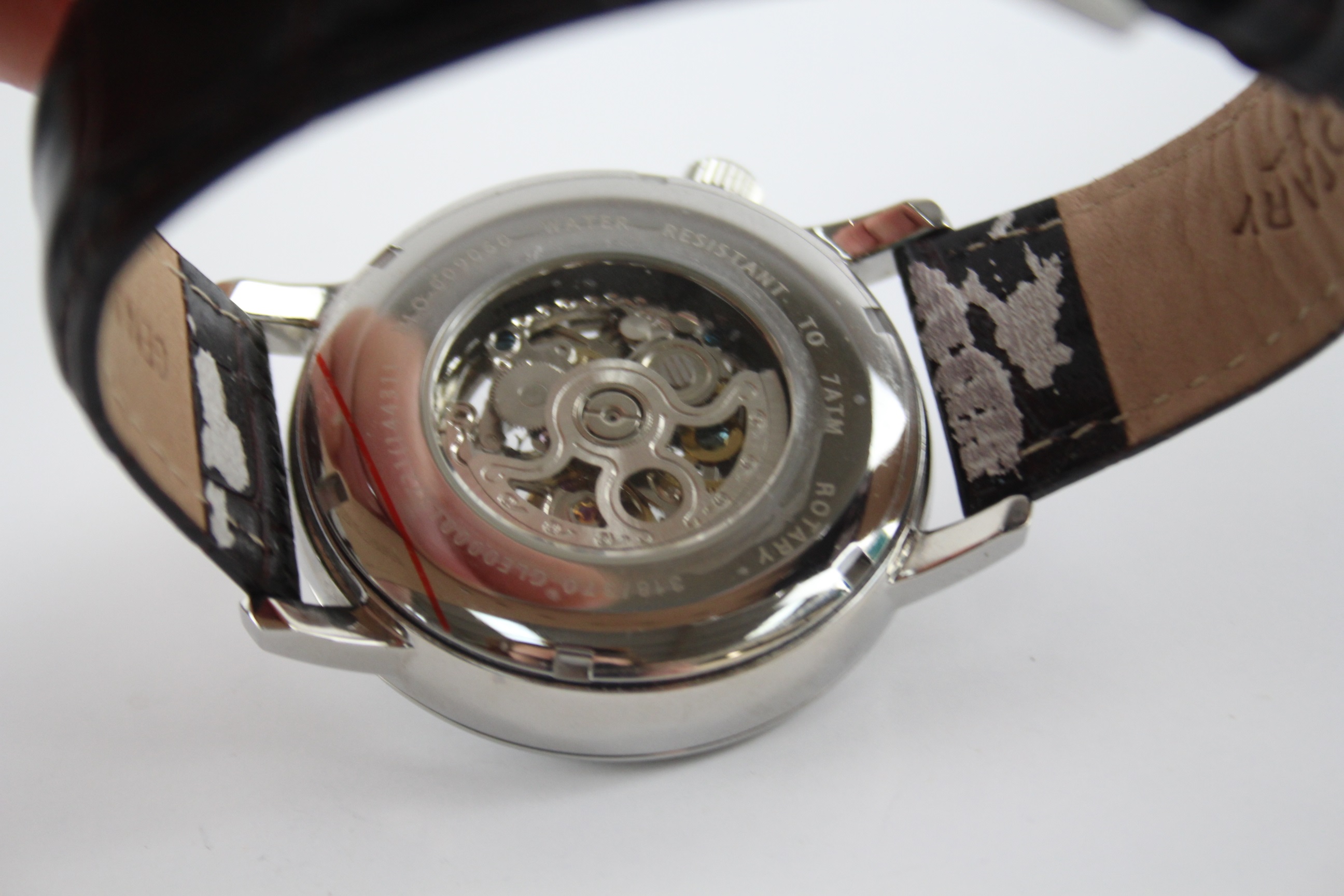 Lot 426 - A MEN'S ROTARY SKELETON DRESS WATCH
