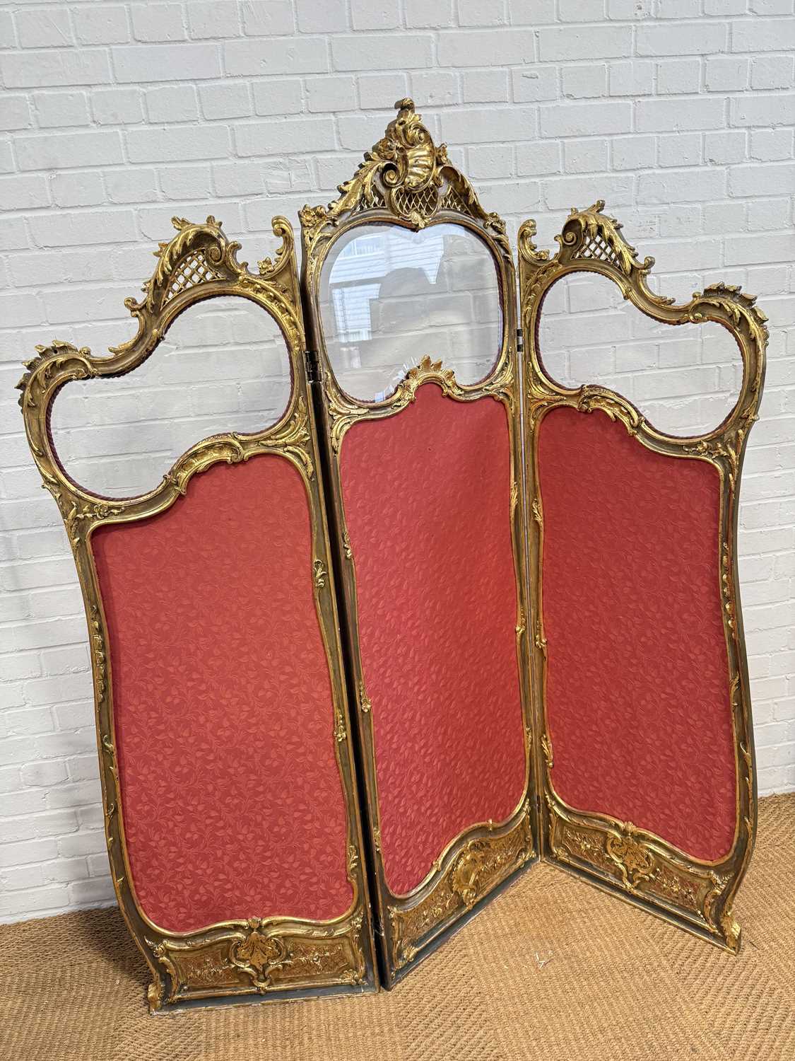 Lot 735 - A 19TH CENTURY FRENCH ROCOCO GILDED SCREEN