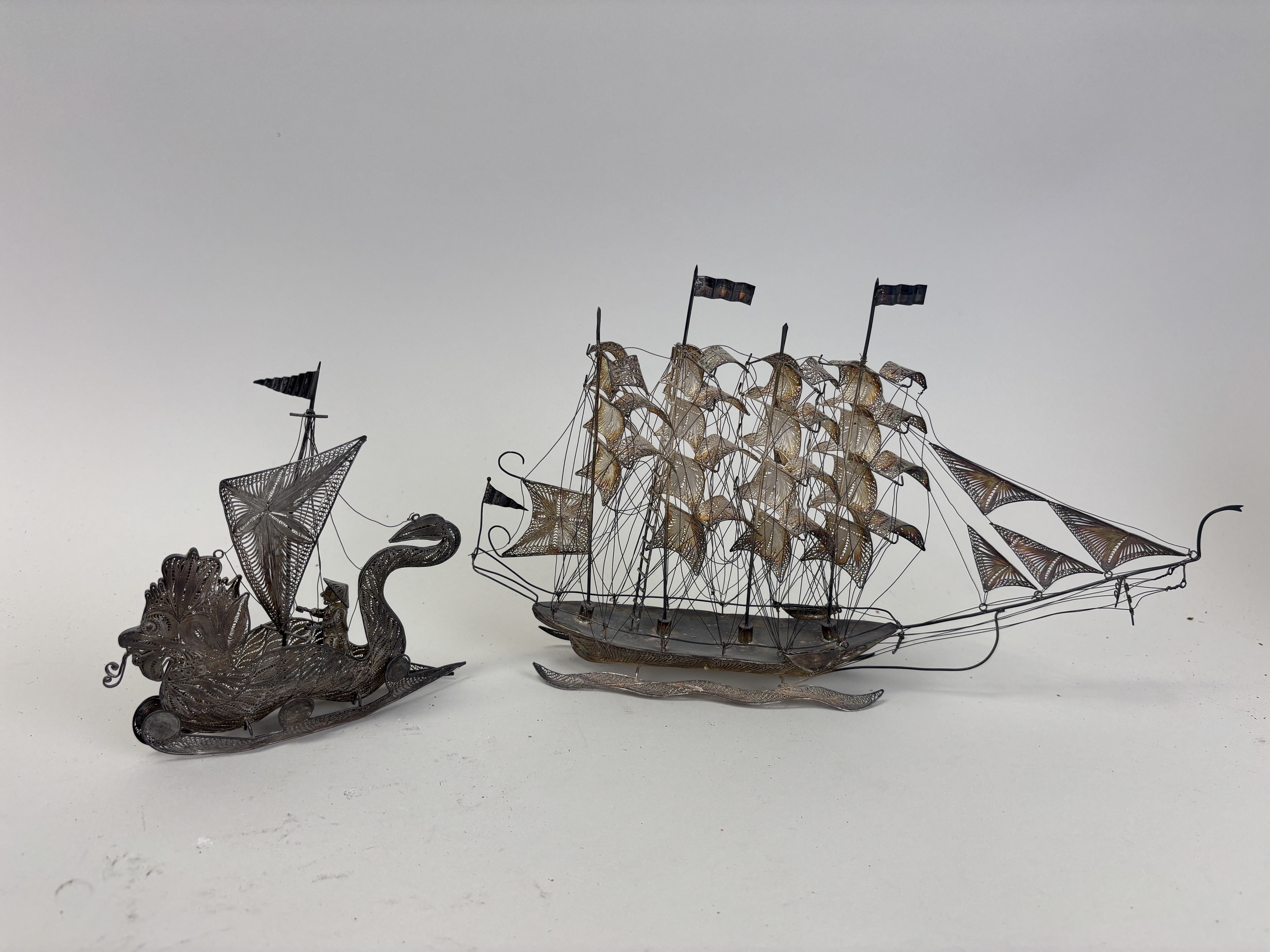 Lot 124 - TWO CHINESE SILVER MODELS OF SHIPS