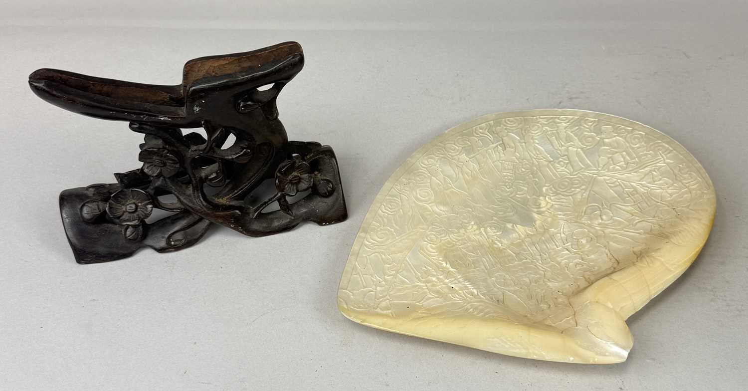 Lot 301 - A CHINESE MOTHER OF PEARL CARVED SHELL WITH