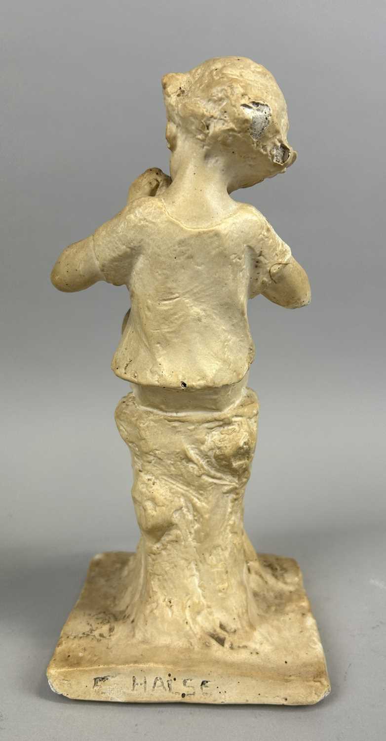 Lot 604 - A PLASTER CAST MODEL OF PETER PAN, SIGNED